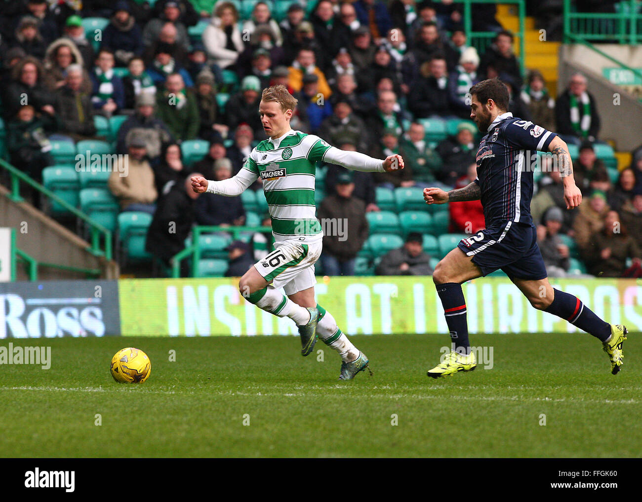 Gary Mackay-Steven of Celtic and Richard Foster of Ross County during ...