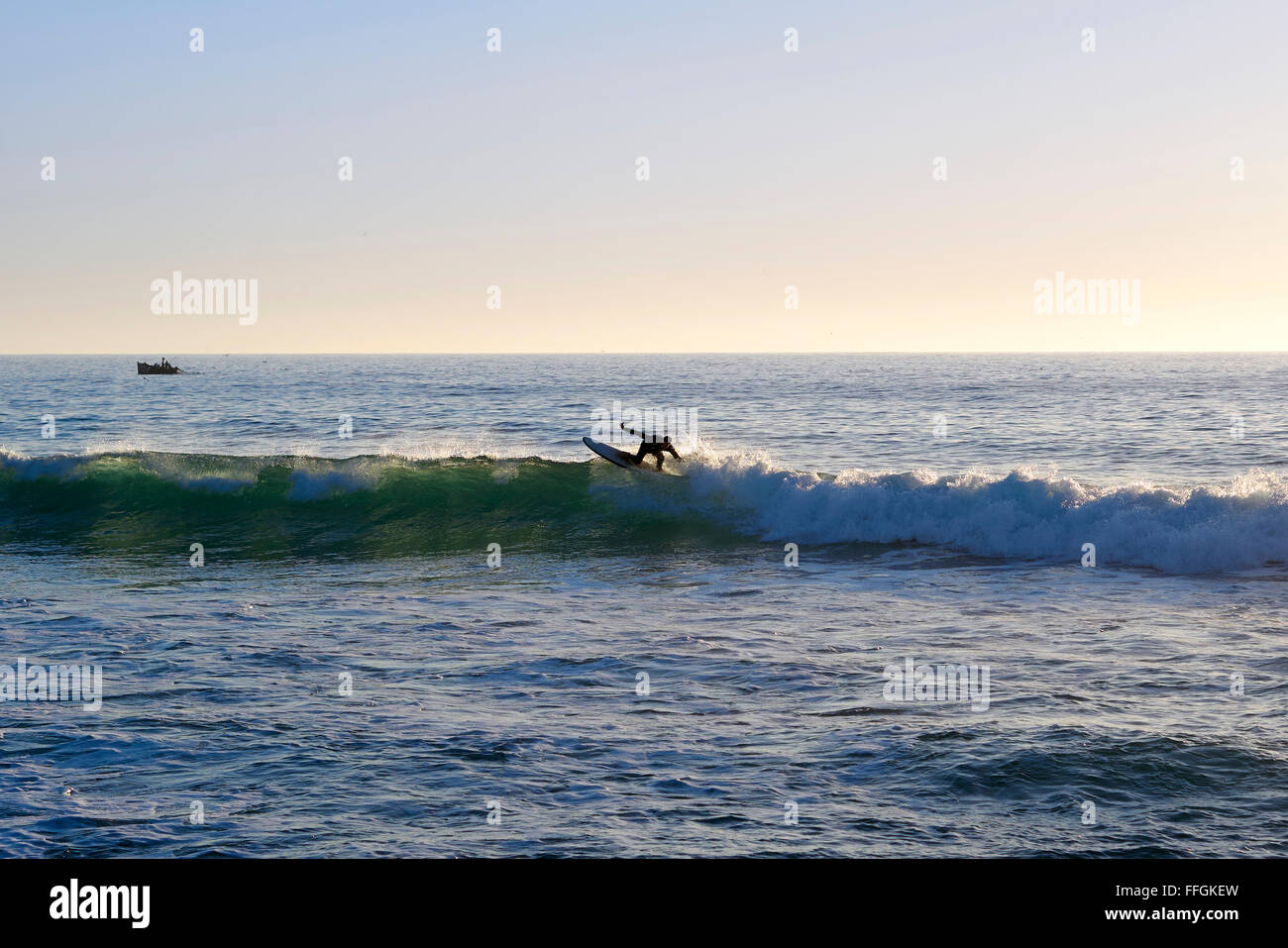Surfer in Tamraght beach, Morocco, Africa Stock Photo - Alamy