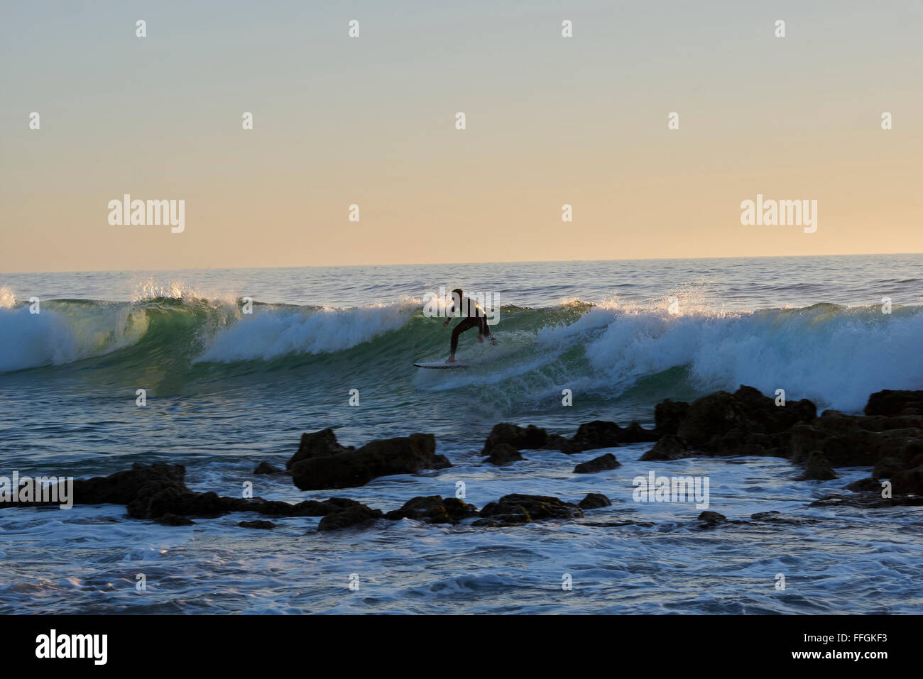 Surfer in Tamraght beach, Morocco, Africa Stock Photo - Alamy