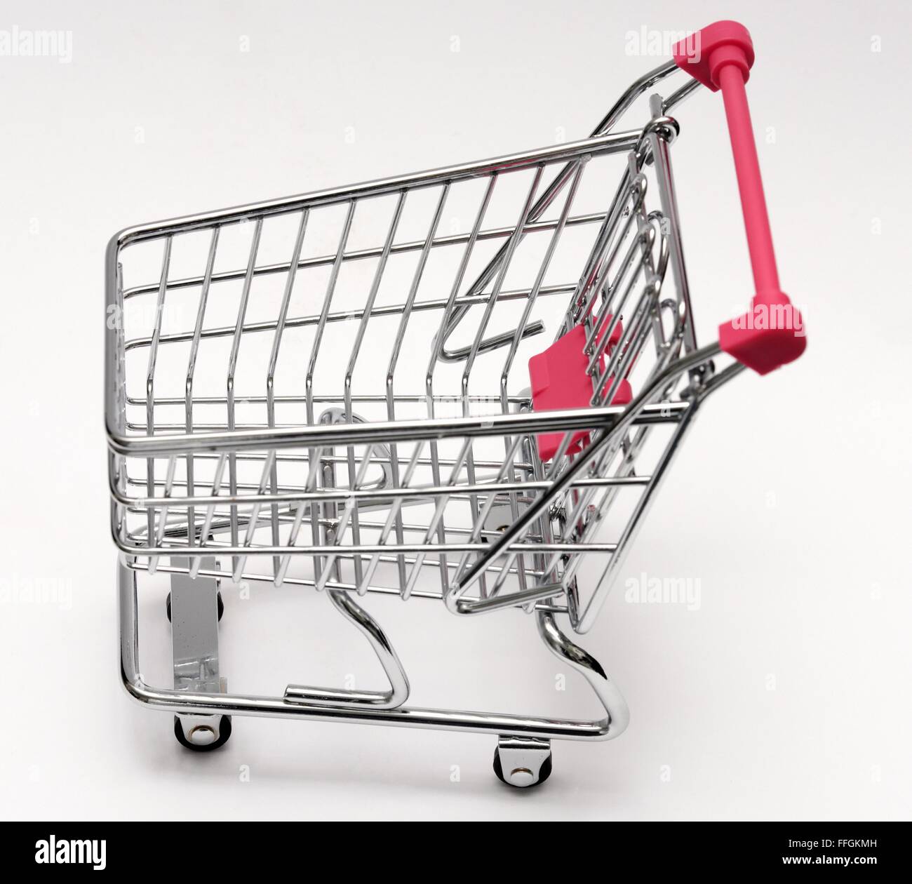 Small supermarket shopping trolley Stock Photo - Alamy