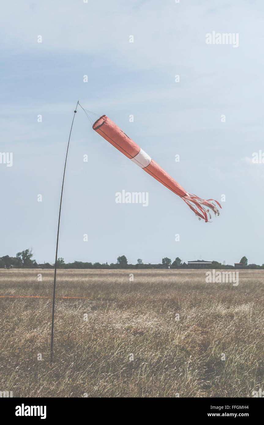 Weathercock driven into the ground field Stock Photo - Alamy