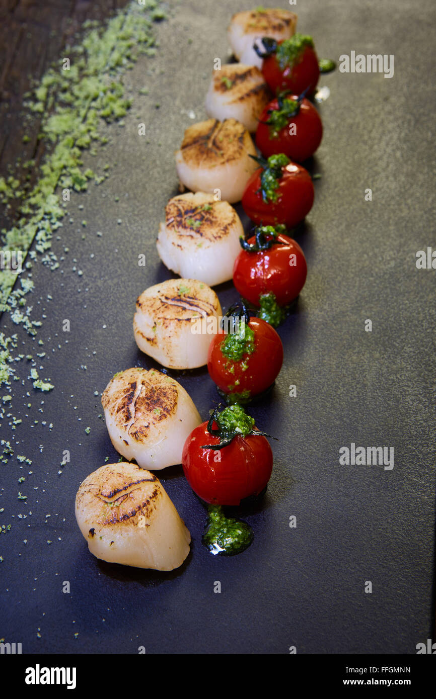 Sea Scallop with Cherry Tomato Stock Photo - Alamy
