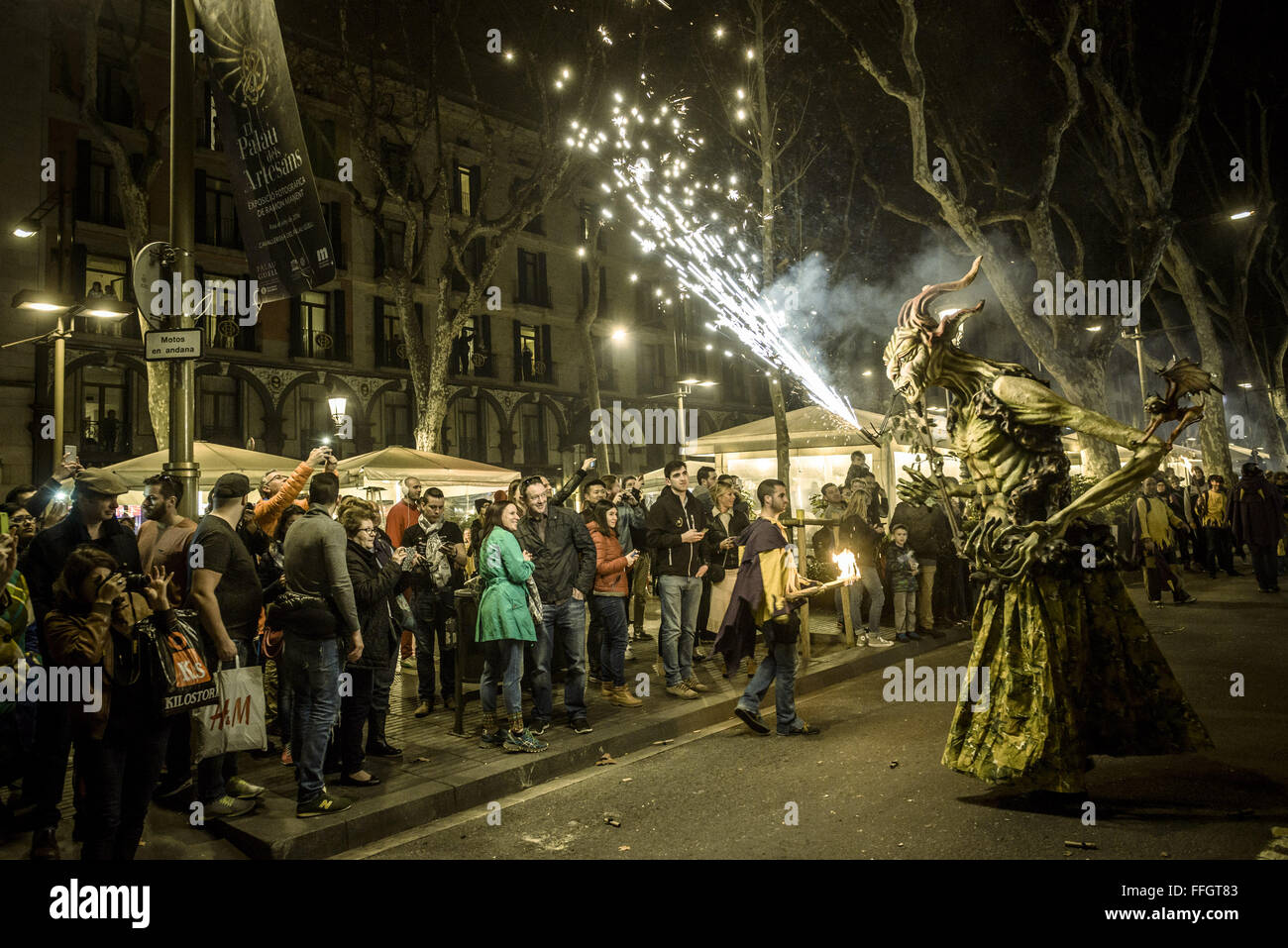 Barcelona, Catalonia, Spain. 13th Feb, 2016. A fire beast sets off his ...