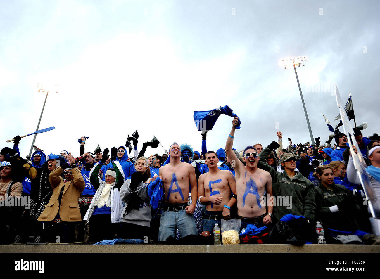 U.S. Air Force Academy cadets cheer after their team scores a touchdown ...