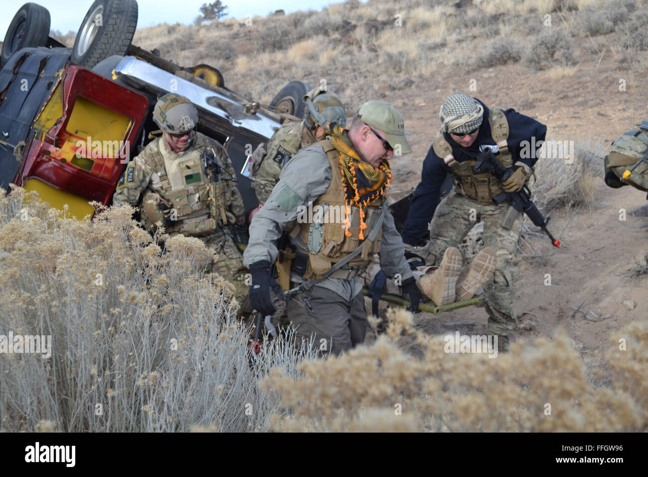 Airmen from the 304th Rescue Squadron remove a patient from an ...