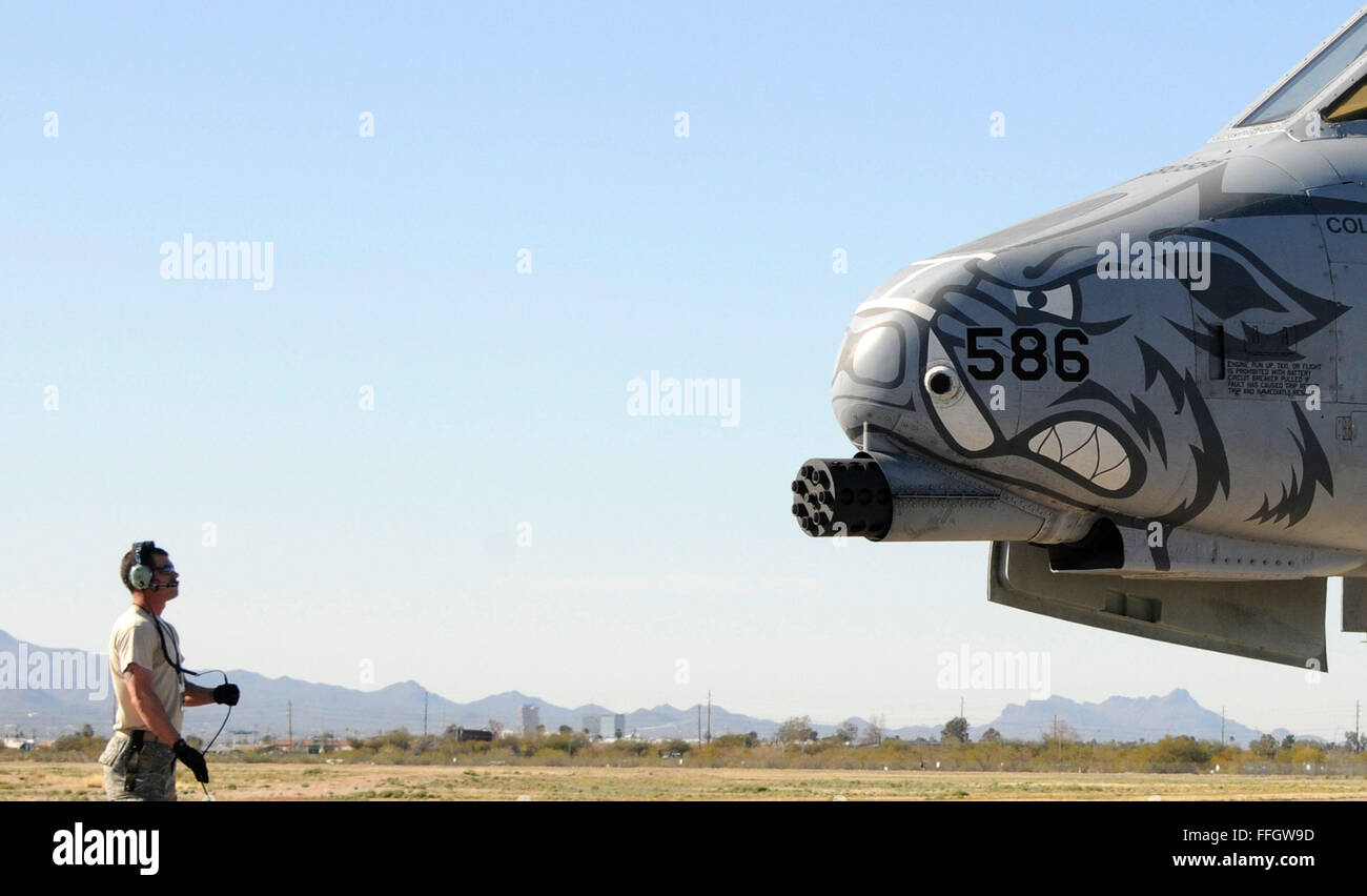 A crew chief with the 188th Fighter Wing communicates with an A-10C ...