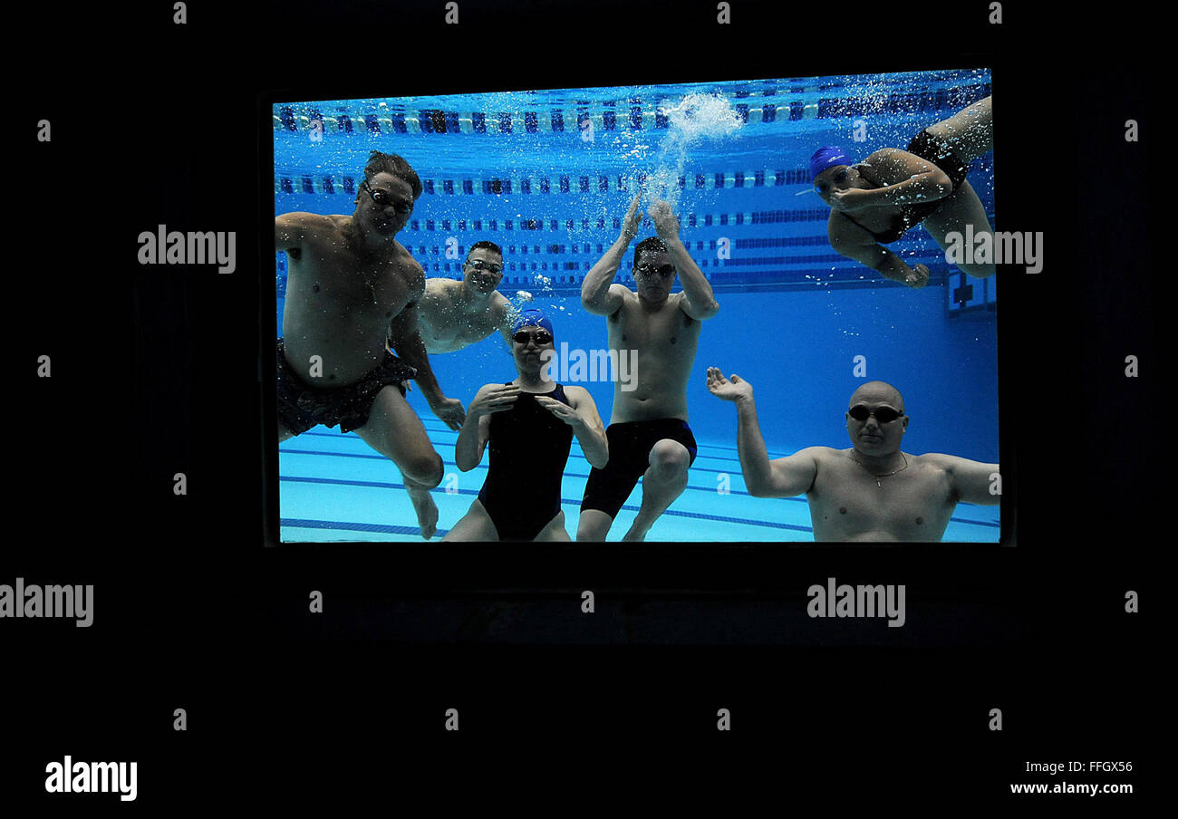 Air Force swimming athletes for the 2012 Warrior Games swim down to a ...