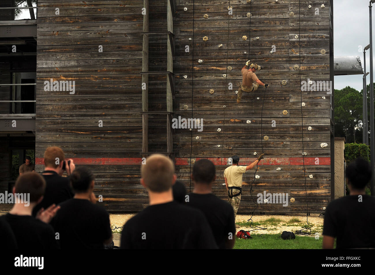 A member of the 23rd Special Tactics Squadron demonstrates rappelling ...