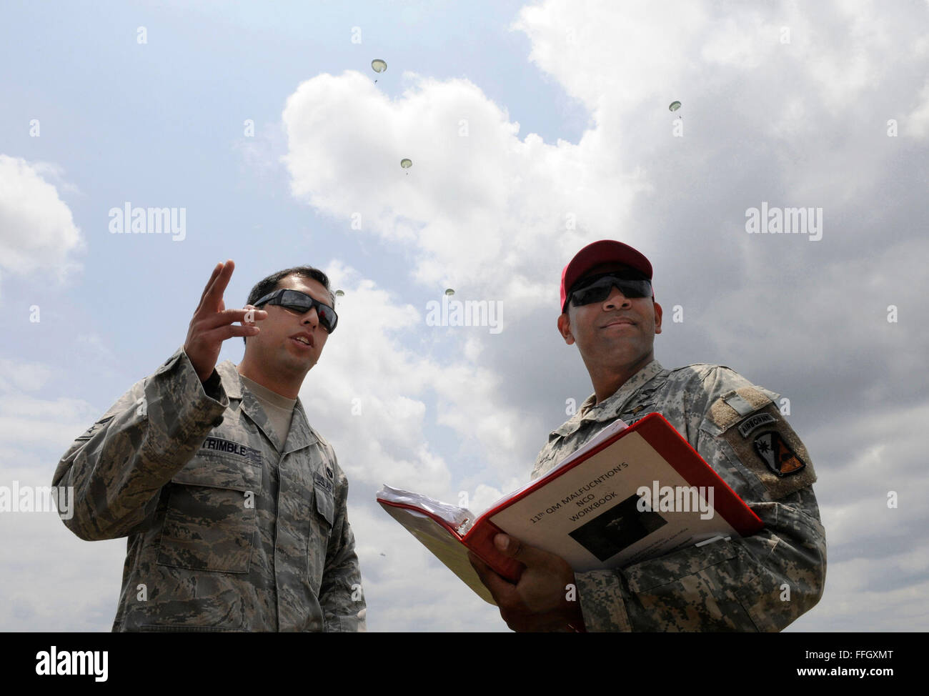 Staff Sgt. Matt Trimble and Army Sgt. Brandon Gilmore discuss landing ...