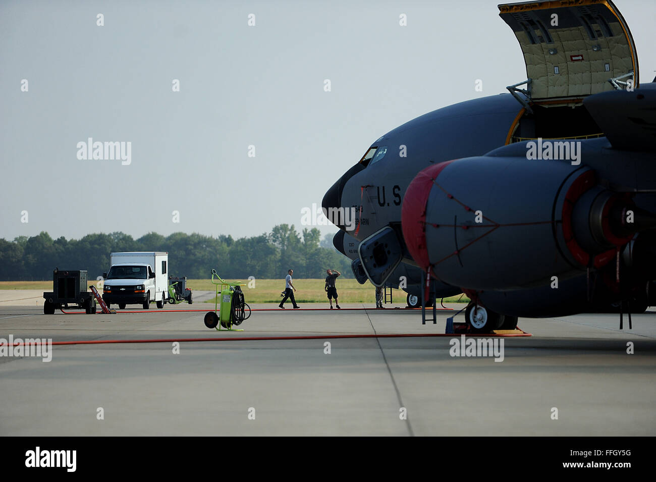 KC-135 maintainers perform pre-flight checks and prepare a KC-135 for a ...