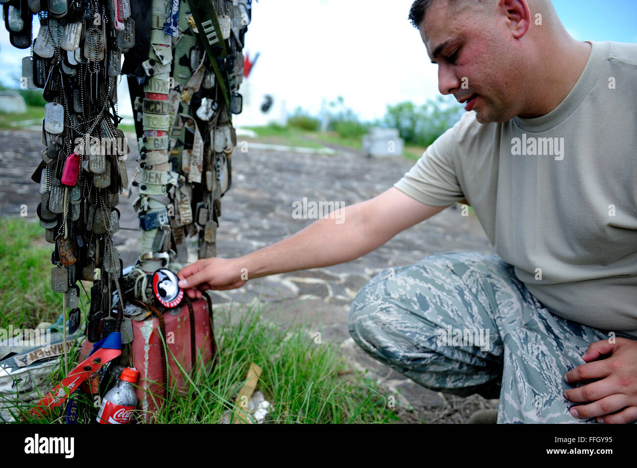 Tech. Sgt. Michael Lydko places an "Eagle Keeper" patch on the Mount ...