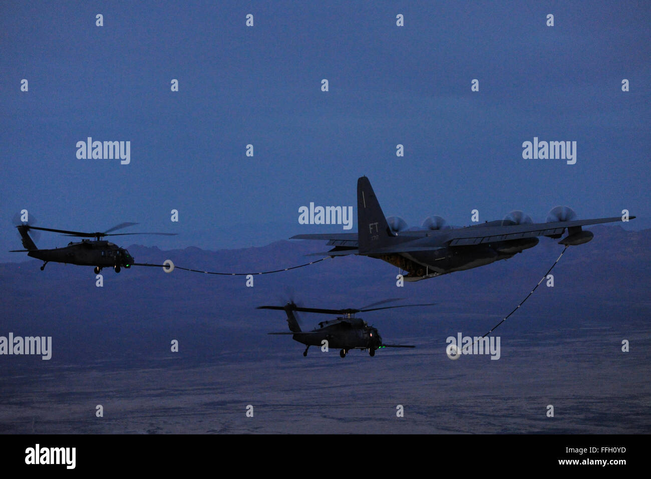 An HC-130J from the 79th Rescue Squadron conducts an aerial refueling ...
