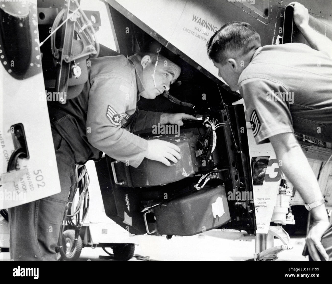 Staff Sgt. Gerald Richey and Tech. Sgt. Harold Cockrum remove ...