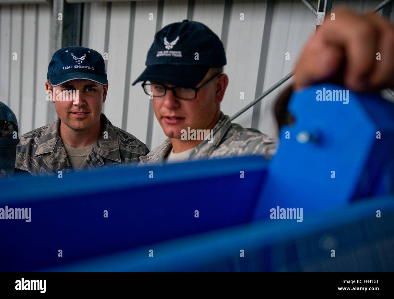 Special Agent David Ohlinger and Staff Sgt. Timothy Hessel look at the ...