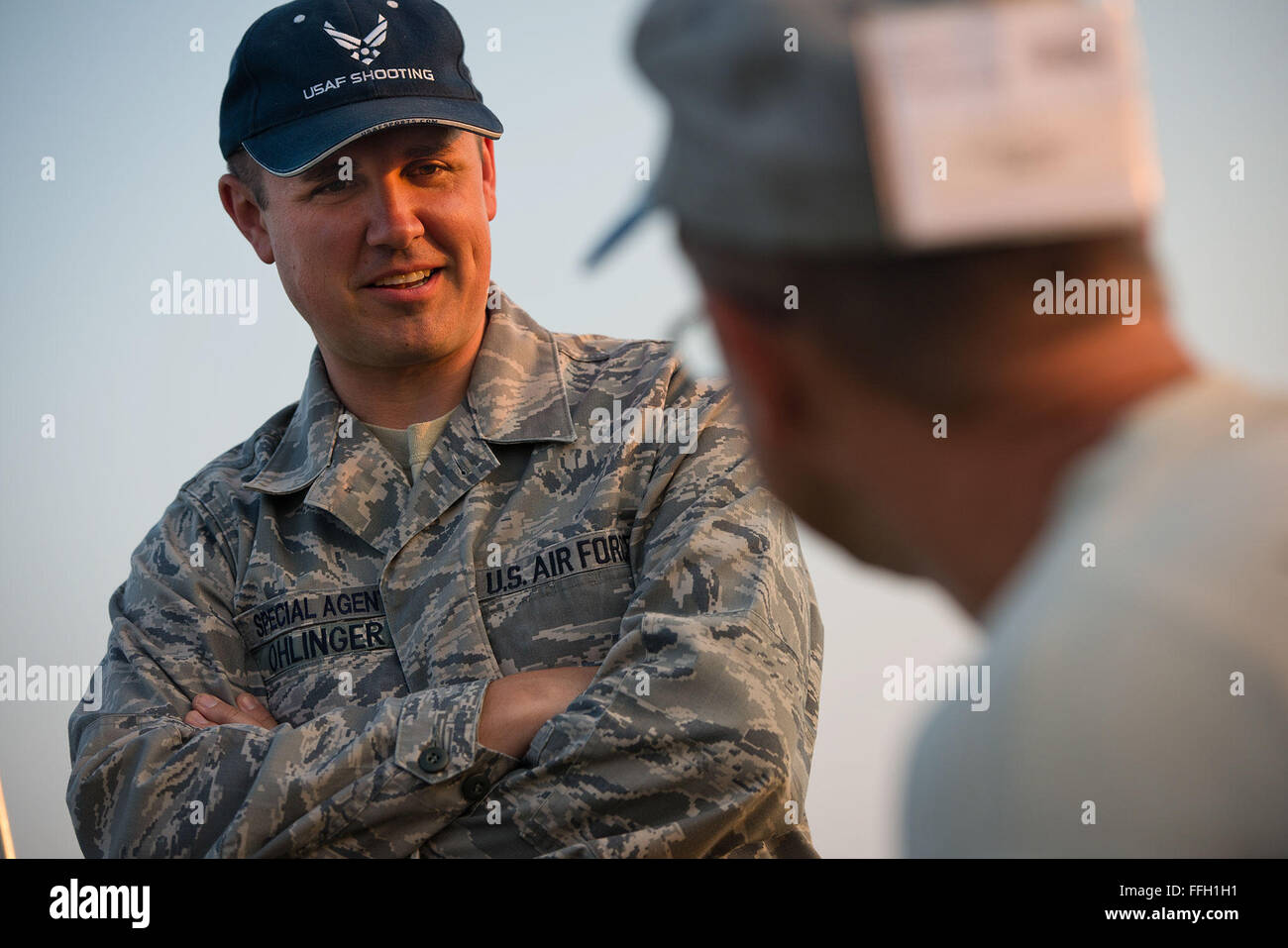 Special Agent David Ohlinger talks to John Holiliger before the start ...