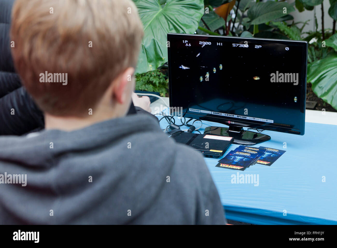 Caucasian child playing computer video game - USA Stock Photo - Alamy