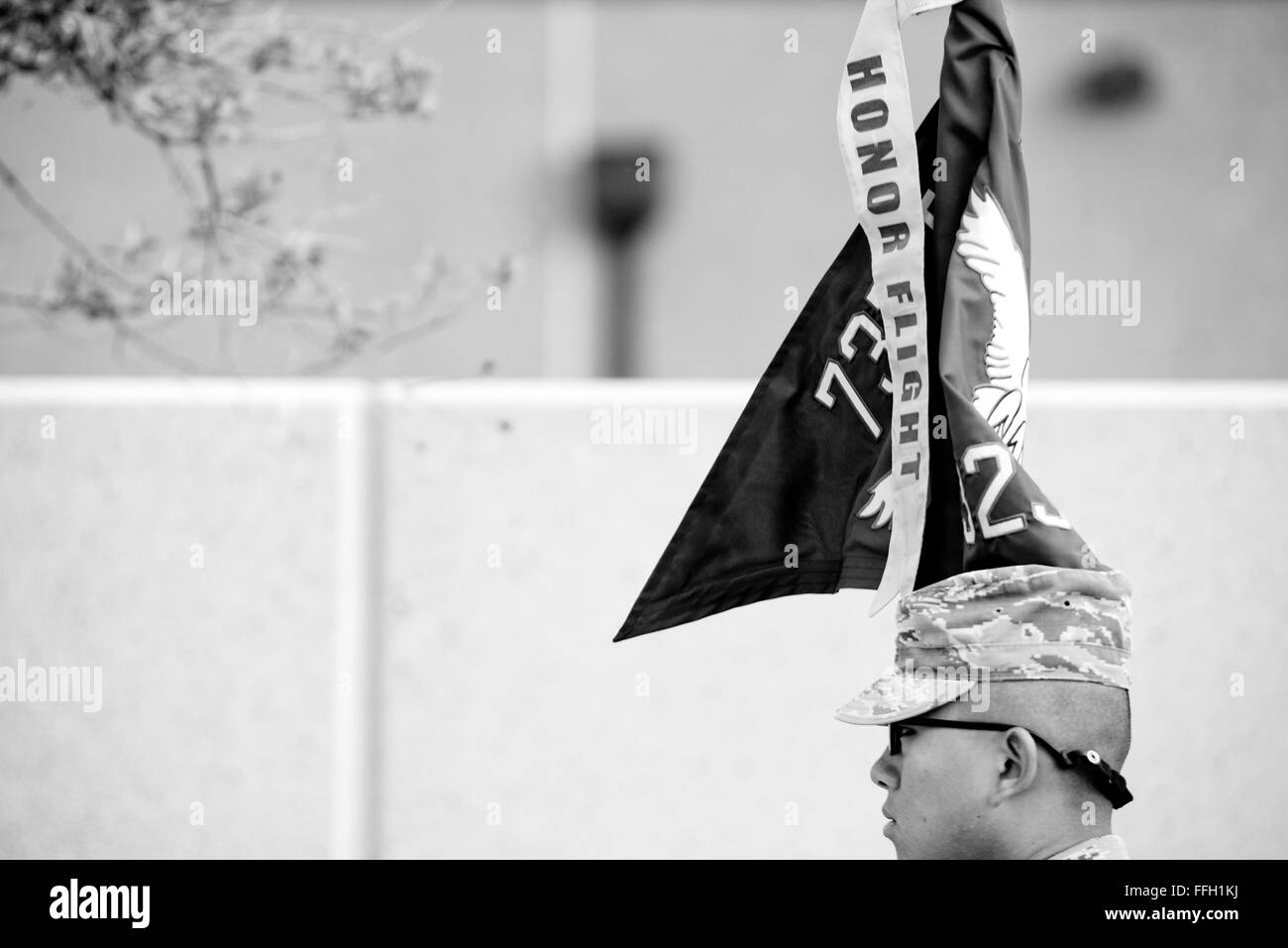 Airman Calvin Kim, guidon bearer for the 323rd Training Squadron's ...
