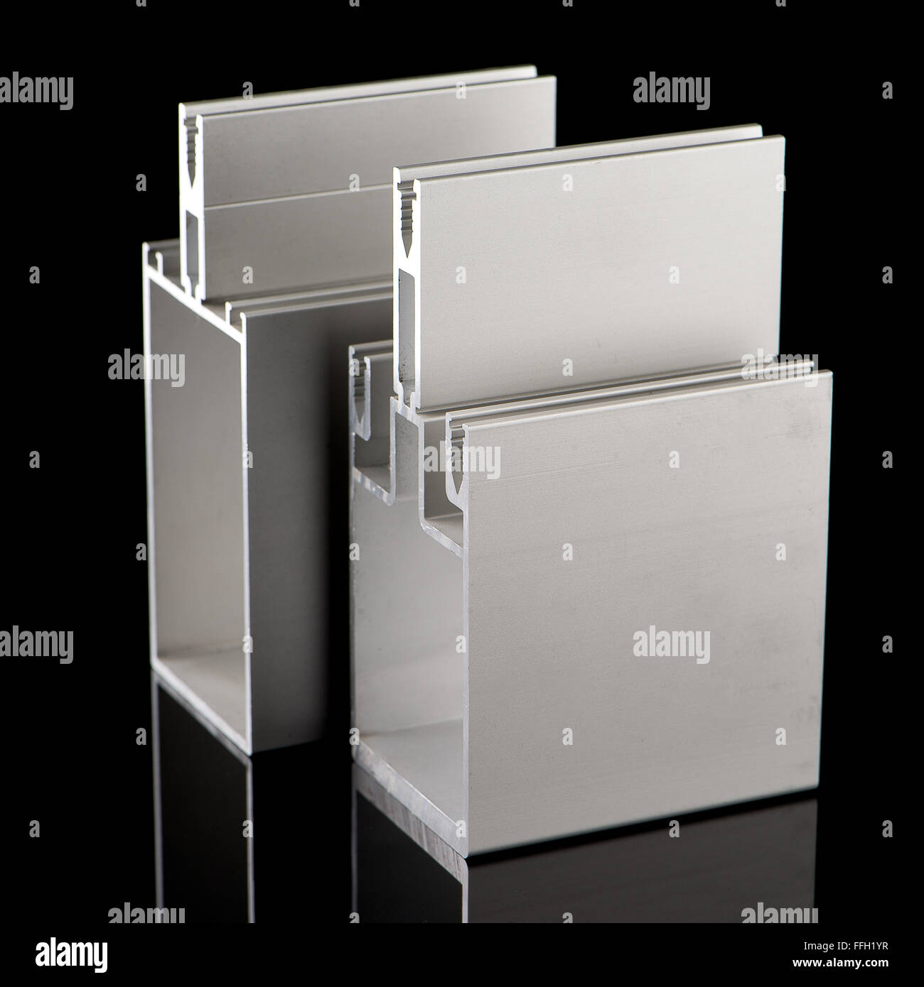 Aluminium profile sample isolated on black background Stock Photo - Alamy