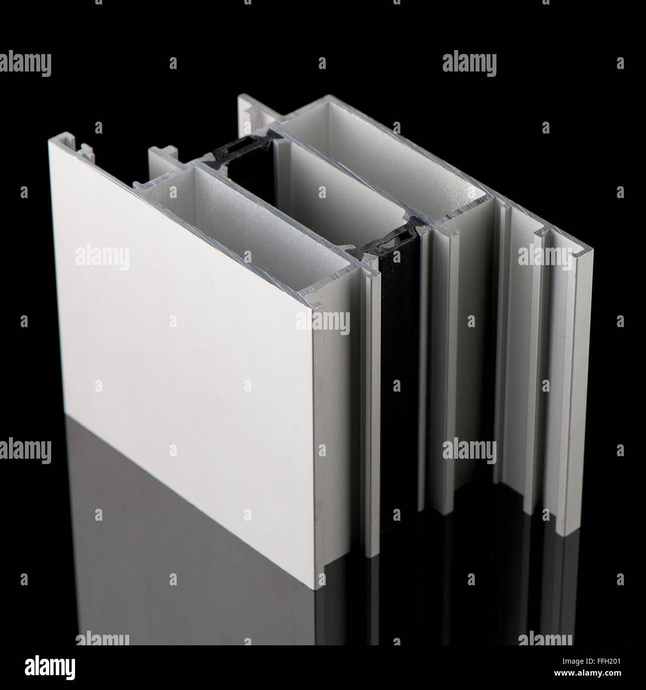 Aluminium profile sample isolated on black background Stock Photo - Alamy