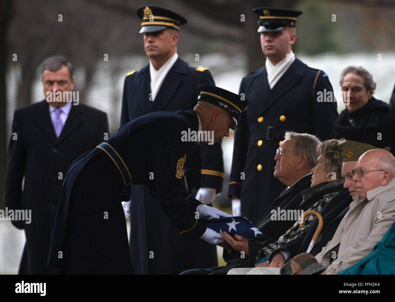 Sgt. Maj. Michael Callaghan-McCann presents the U.S. flag to Theodore ...