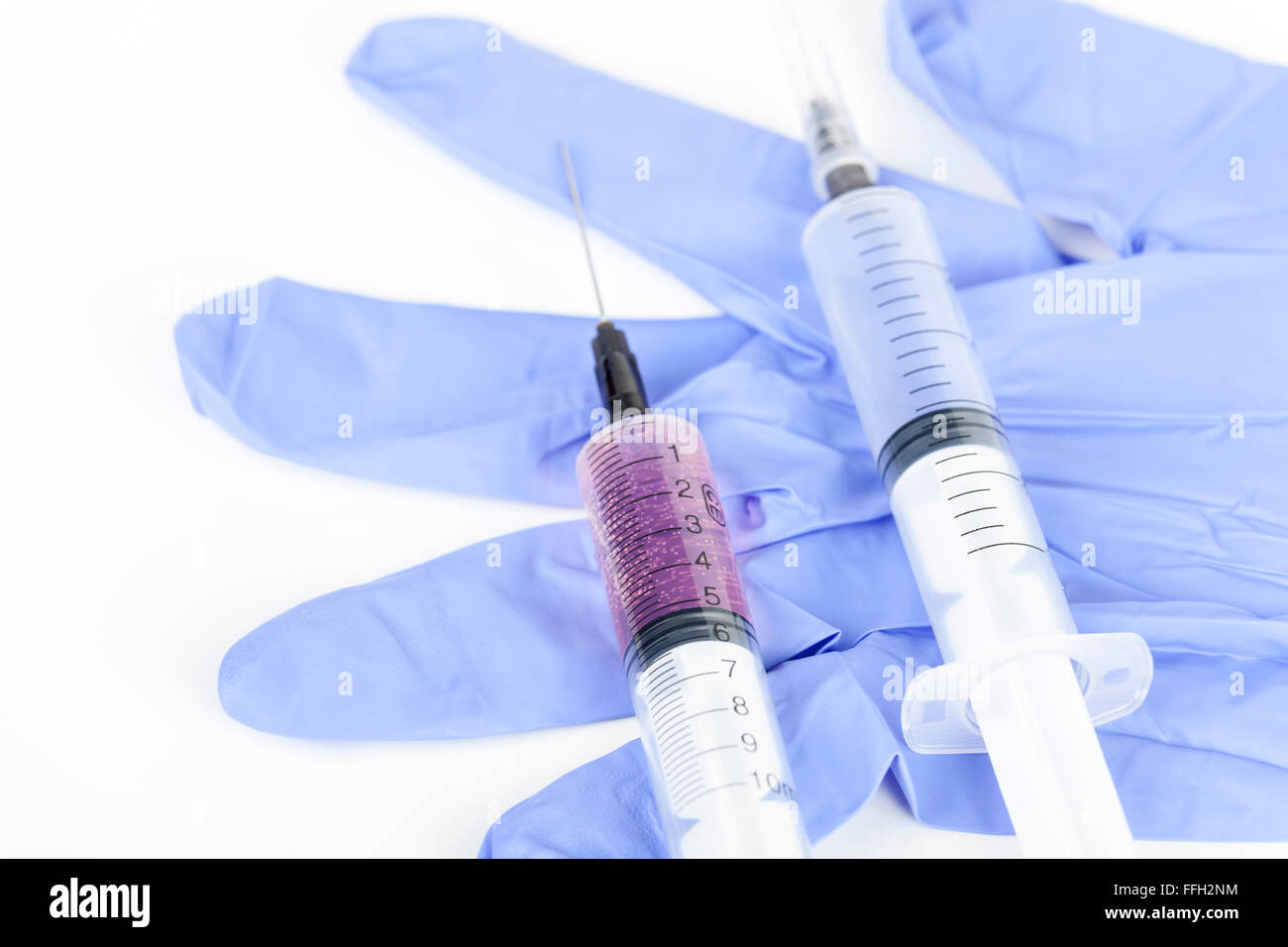 Hypodermic syringes hi-res stock photography and images - Alamy
