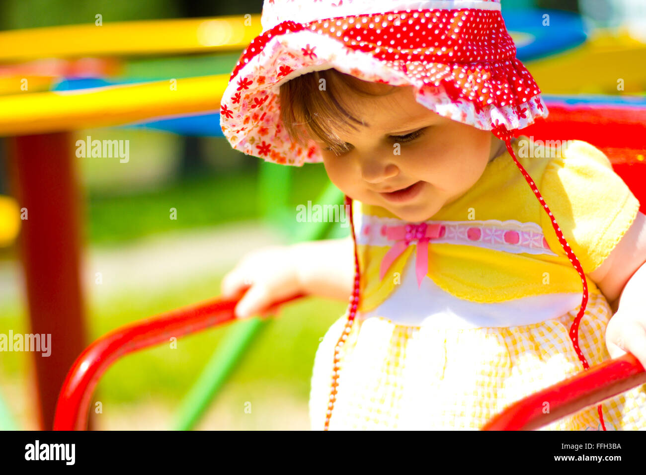 Girls on roundabout hi-res stock photography and images - Alamy