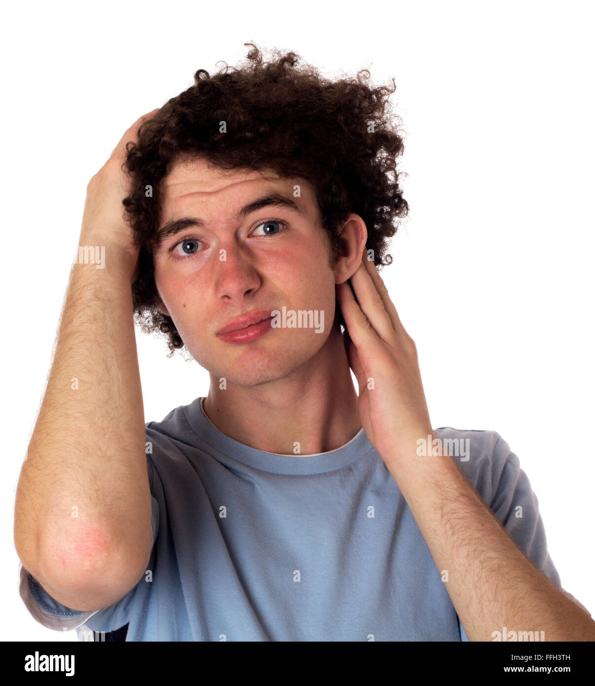 lop-eared teenager with a bored look on his face and downcast ...