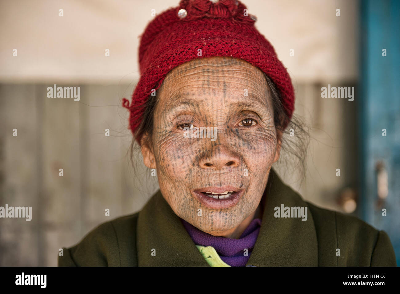 A Yindu Chin woman with face tattoos in Kanpetlet, Myanmar Stock Photo ...
