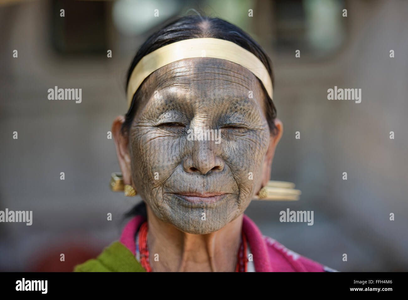 A Yindu Chin woman with face tattoos in Kanpetlet, Myanmar Stock Photo ...