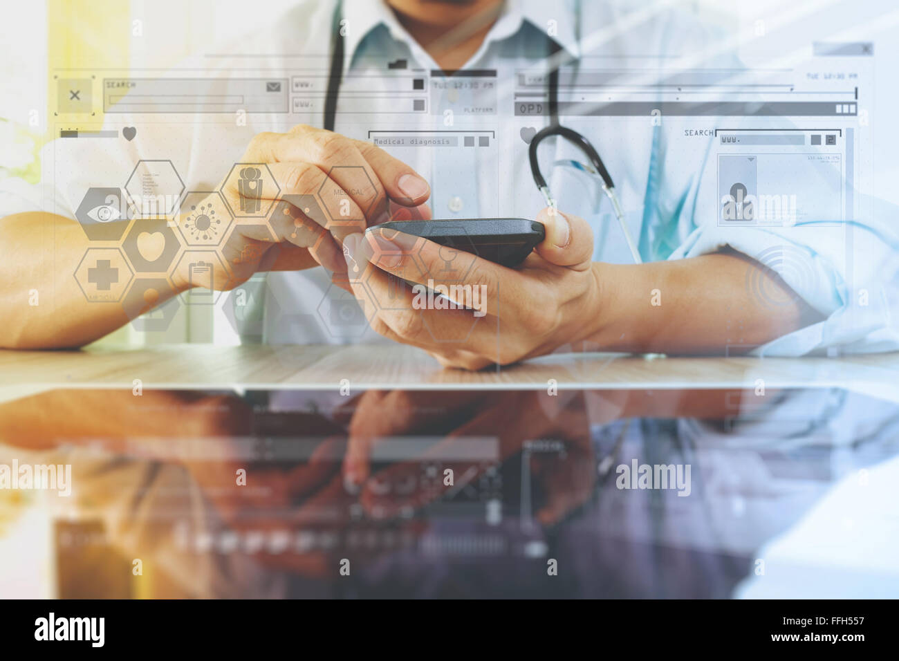 Medicine doctor hand working with modern smart phone with computer ...