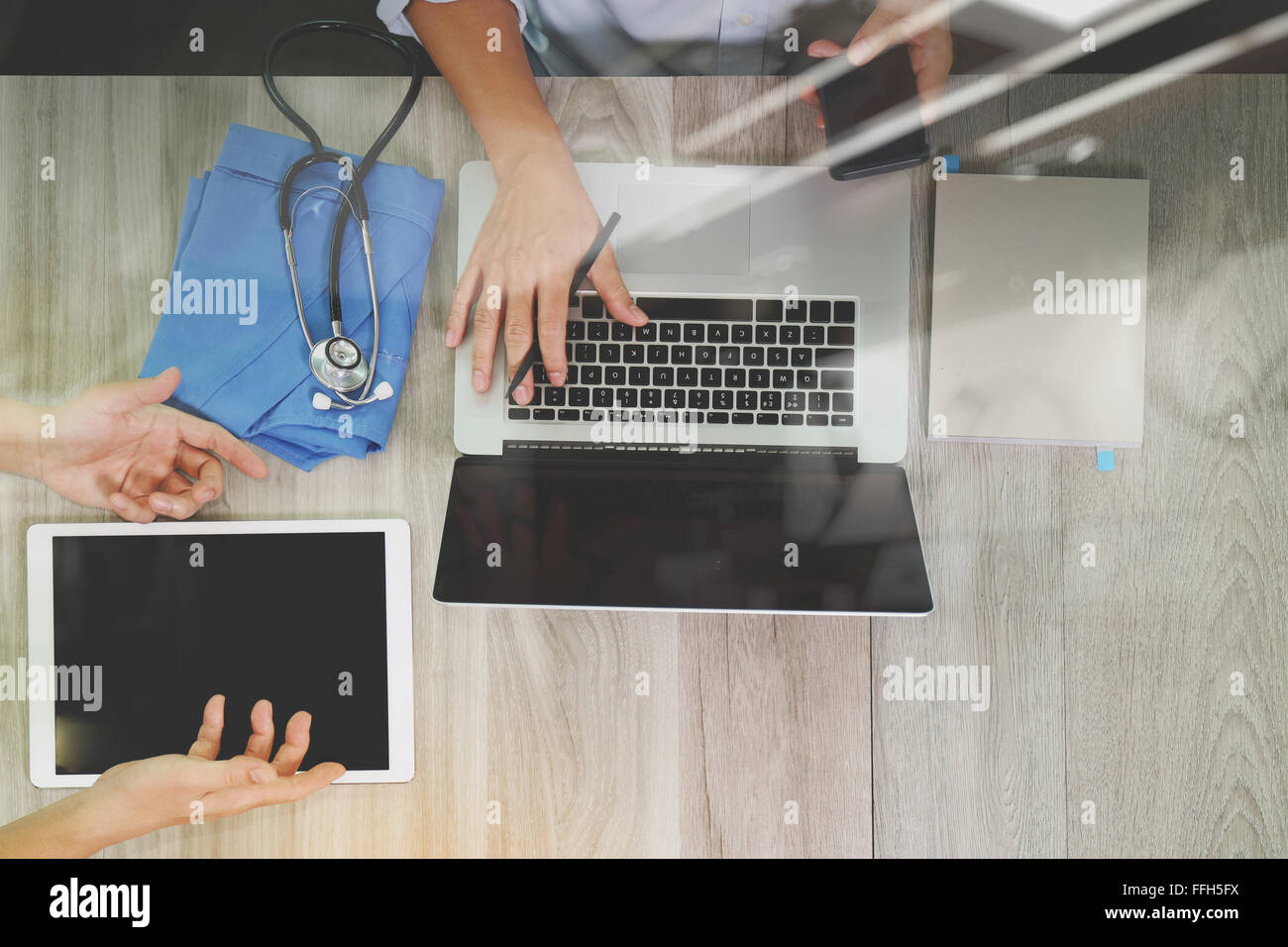 top view of Medicine doctor hand working with modern computer and ...
