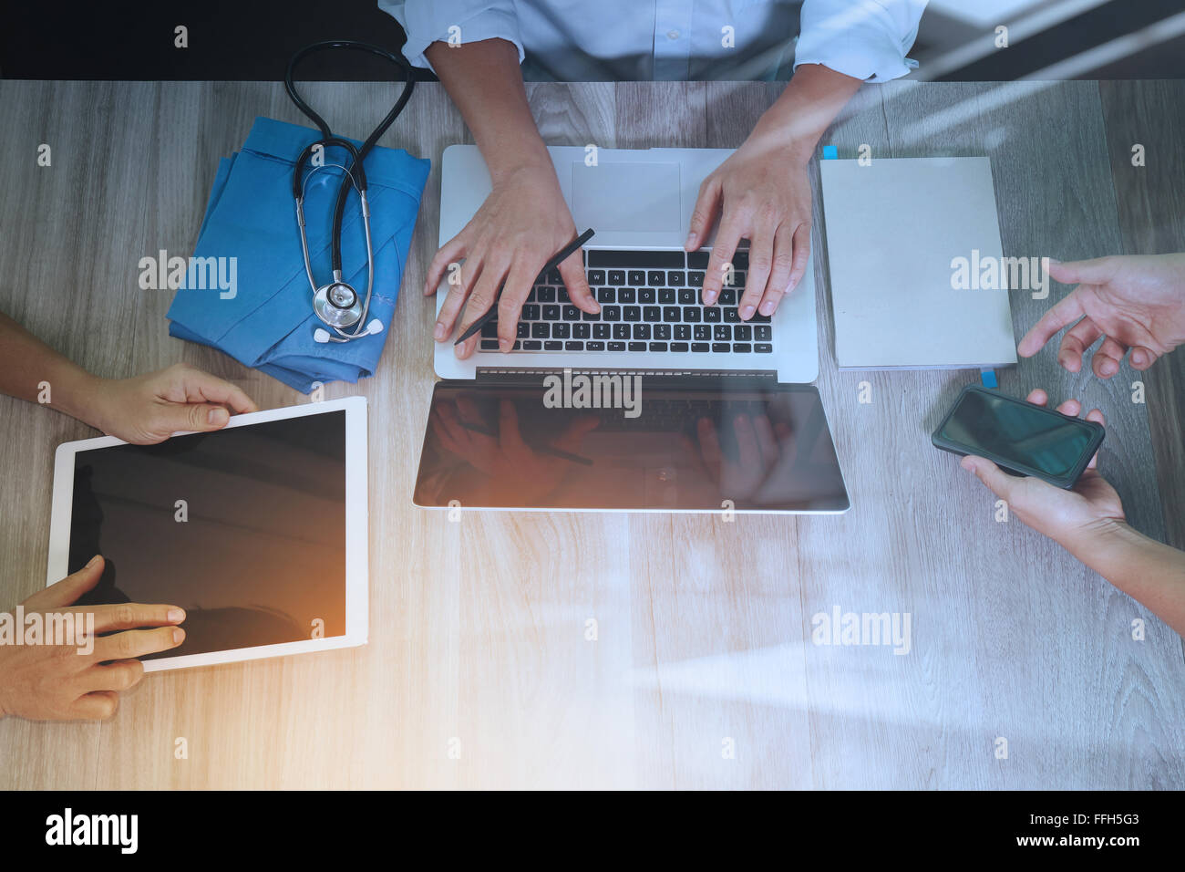 top view of Medicine doctor hand working with modern computer and ...