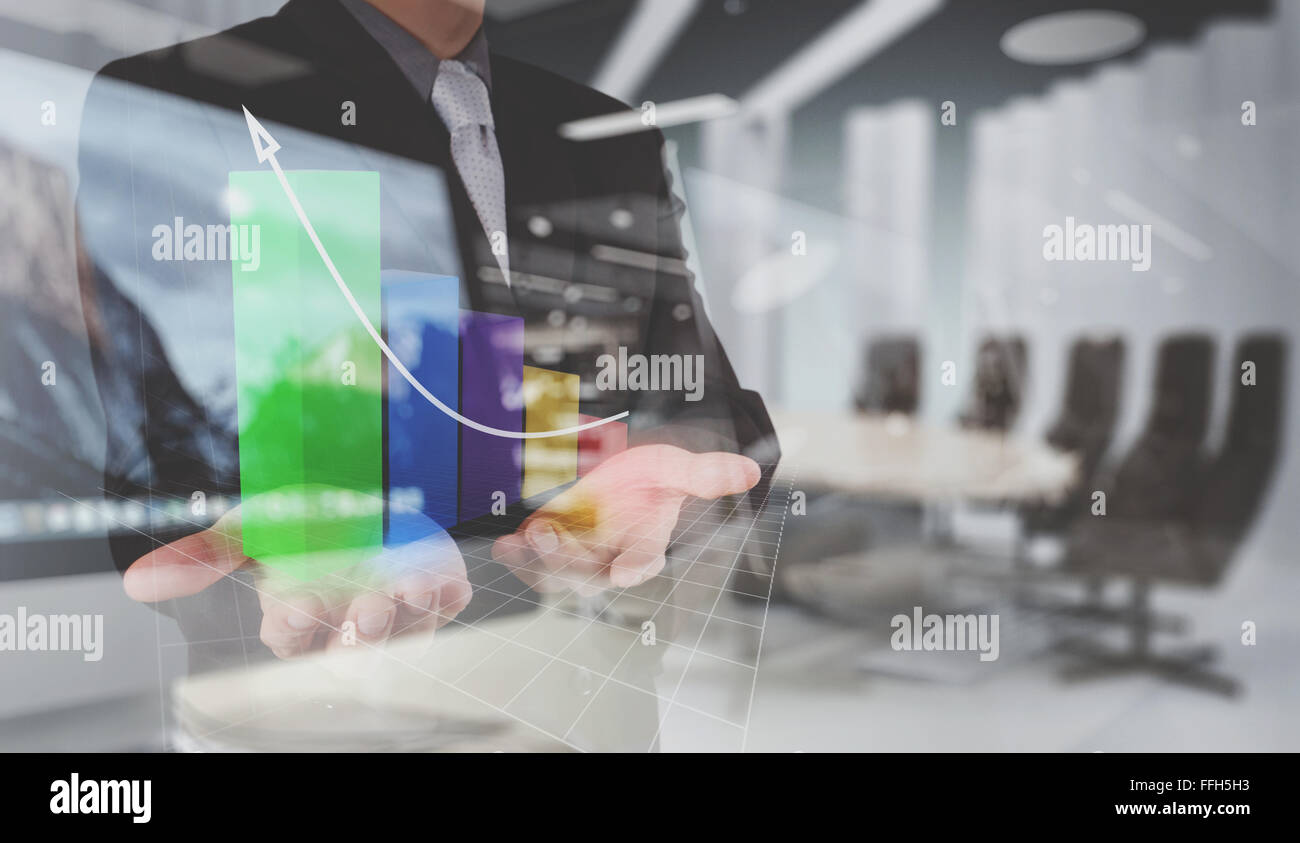 double exposure of businessman hand working with new modern computer ...