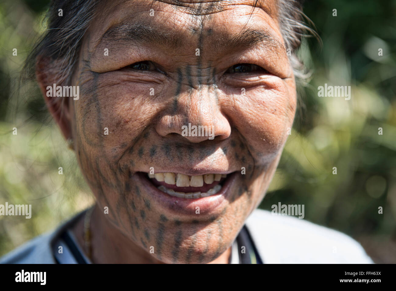 A Muun Chin woman with face tattoos, Mindat, Myanmar Stock Photo - Alamy