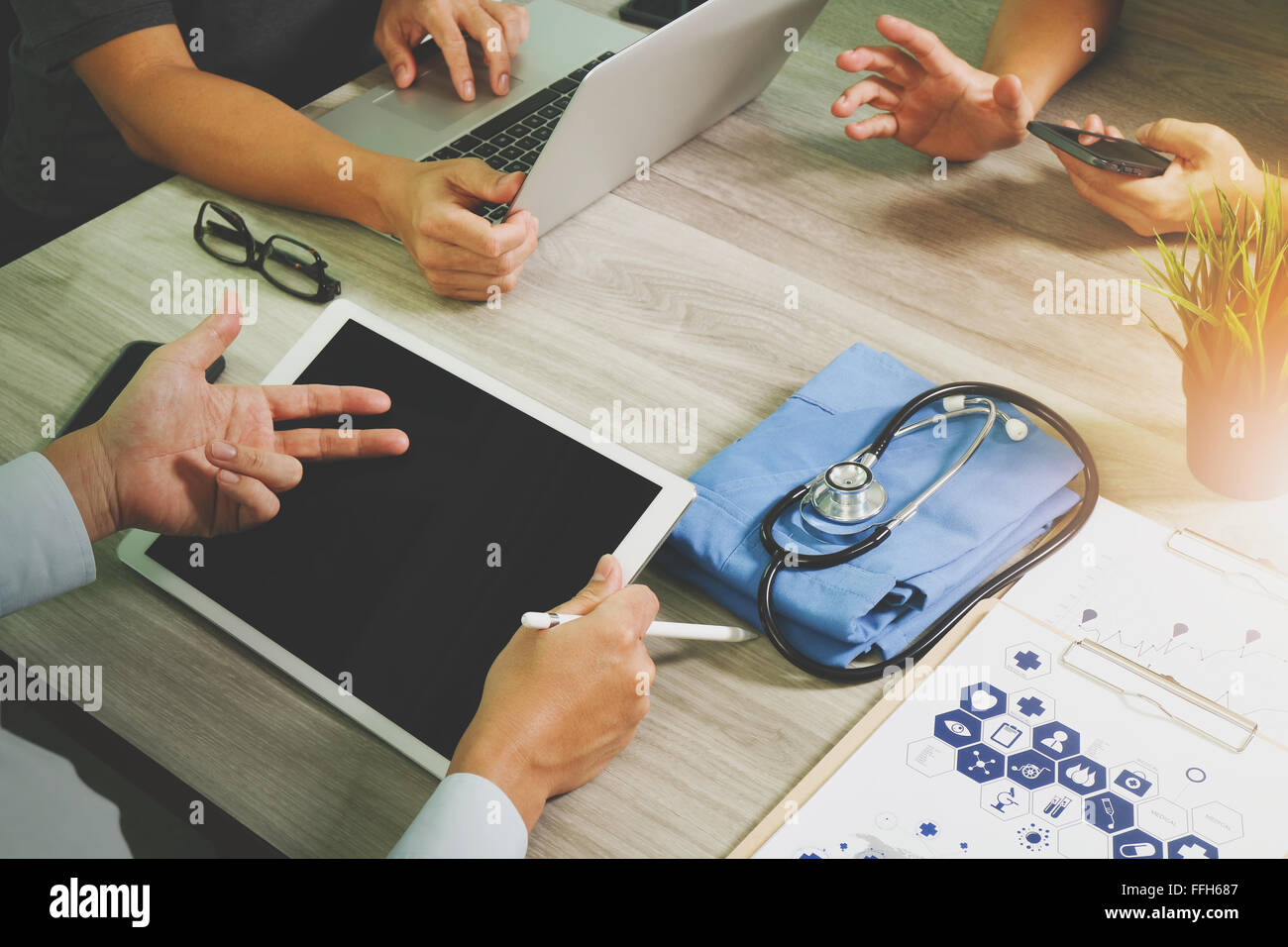 top view of Medicine doctor hand working with modern computer and ...