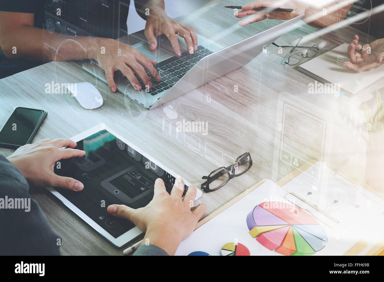 business documents on office table with smart phone and laptop computer ...