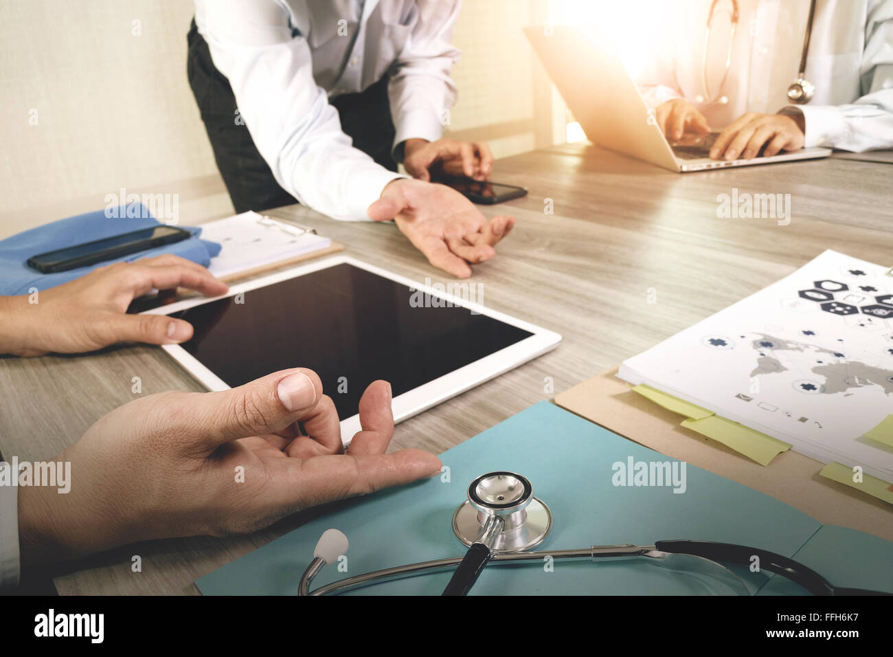 Medicine doctor hand working with modern computer and digital pro ...
