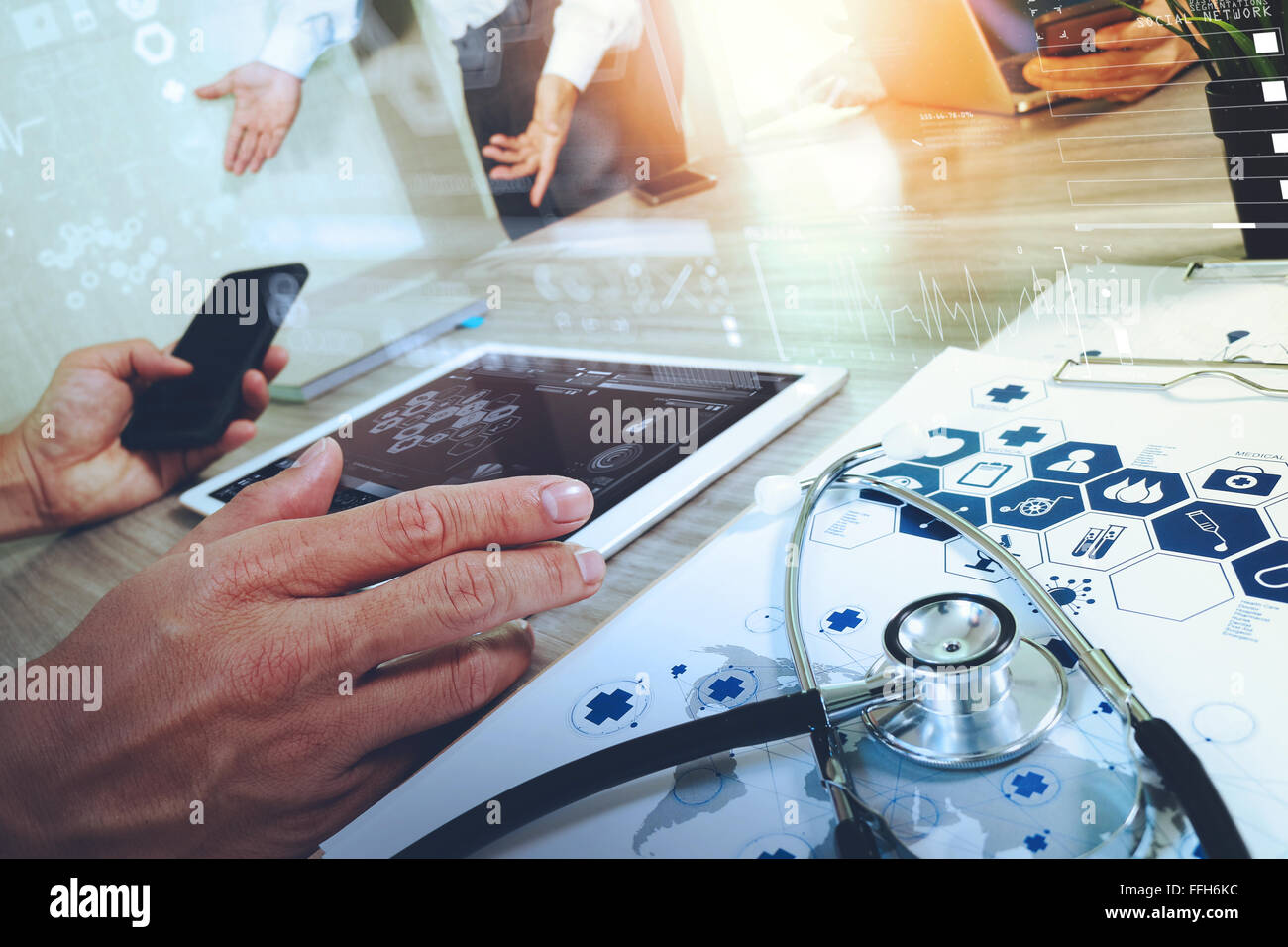 Medicine doctor hand working with modern computer and digital pro ...