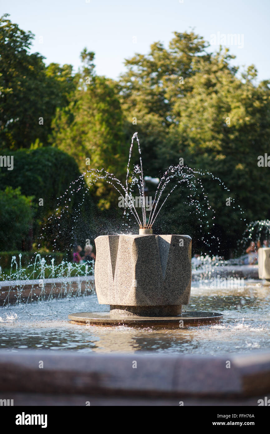 Water stream splashing on ground Stock Photo - Alamy