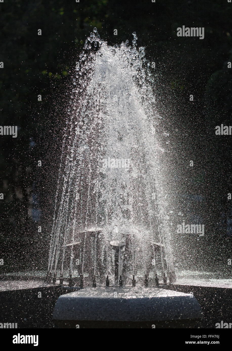 Water stream splashing on ground Stock Photo - Alamy