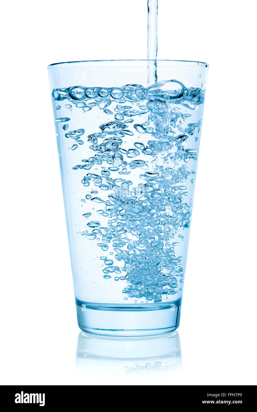 Water pouring into a glass, isolated on the white background, clipping path included Stock Photo ...