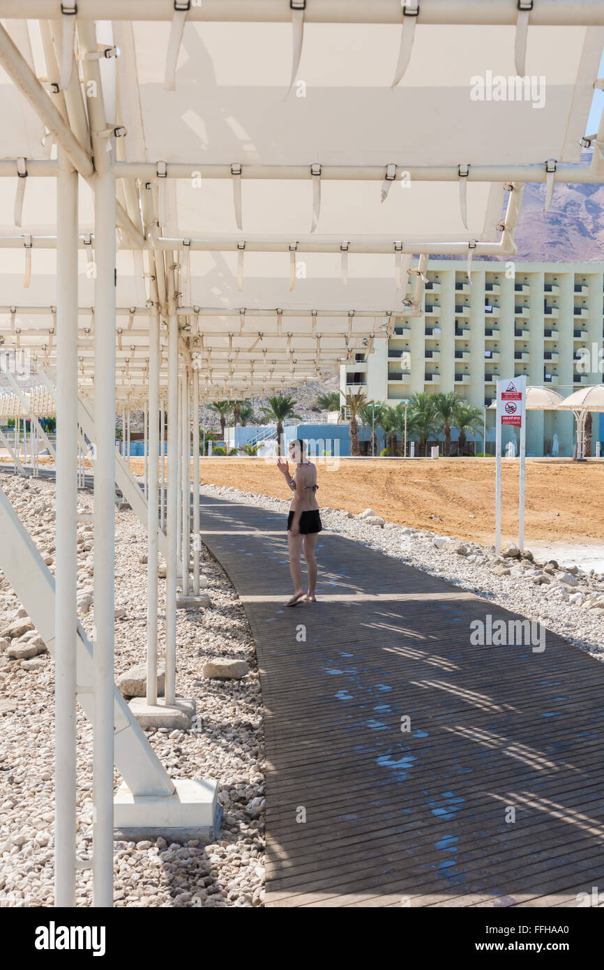 Woman resting on the beach Dead Sea Stock Photo - Alamy