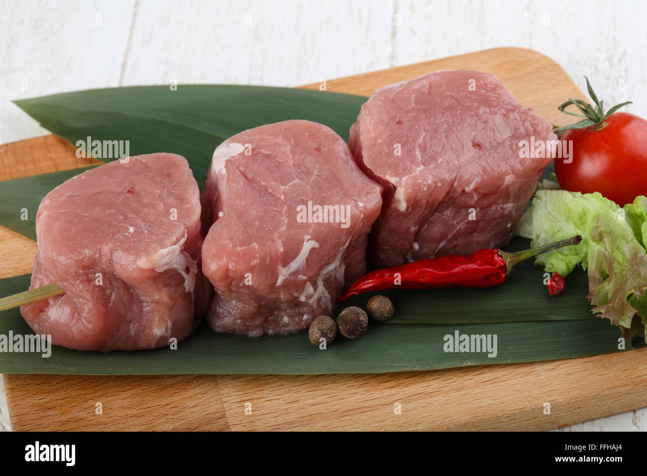 Raw pork fillet mignon ready for cooking Stock Photo - Alamy