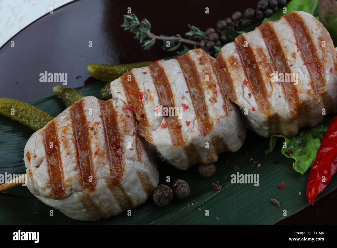 Grilled pork Fillet mignon with herbs and spices Stock Photo - Alamy