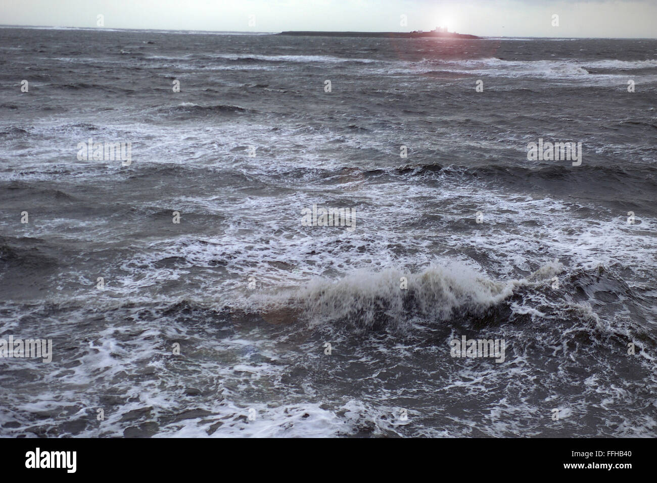 Coquet Island Lighthouse / Stormy sea Stock Photo - Alamy