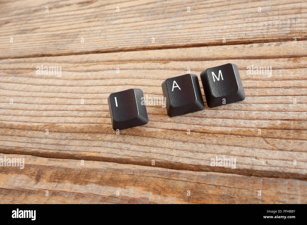 I AM wrote with keyboard keys on wooden background Stock Photo - Alamy