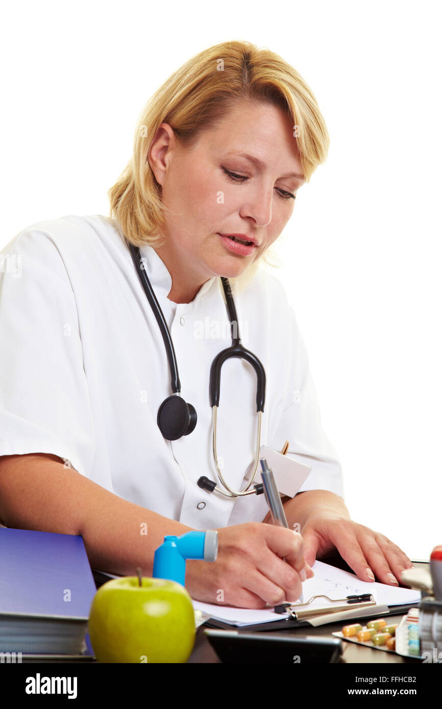 Doctor taking some medical notes on clipboard Stock Photo - Alamy