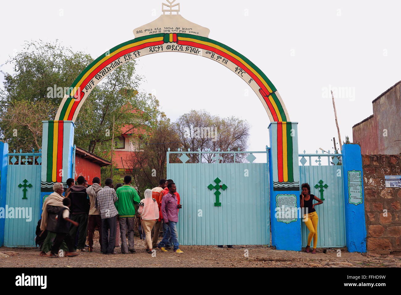 KOMBOLCHA, ETHIOPIA-MARCH 24: Group of devotees enter the church ...