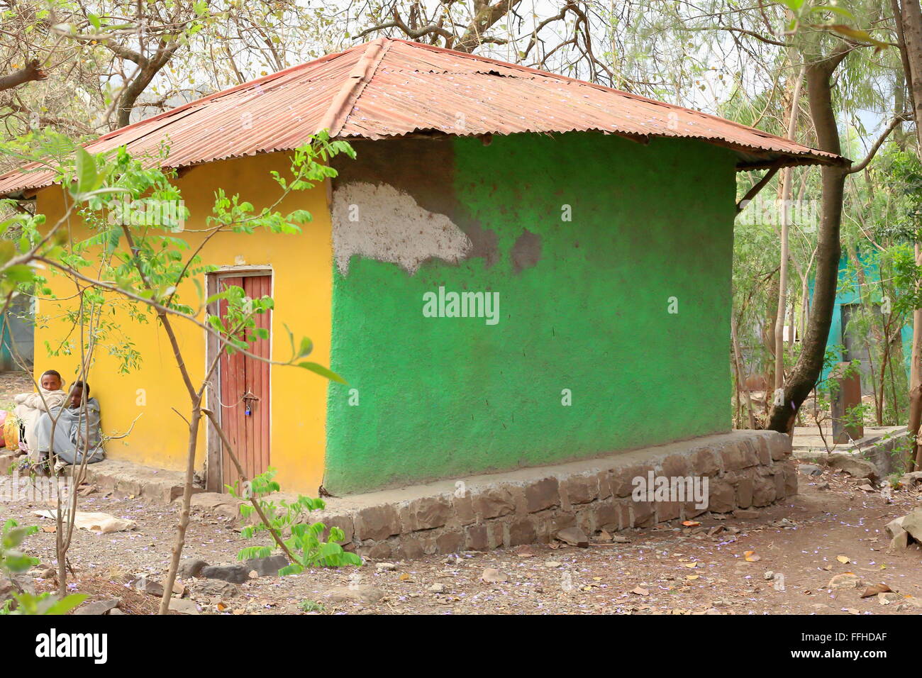 KOMBOLCHA, ETHIOPIA-MARCH 24: Pair of devotees wait inside the Bete ...