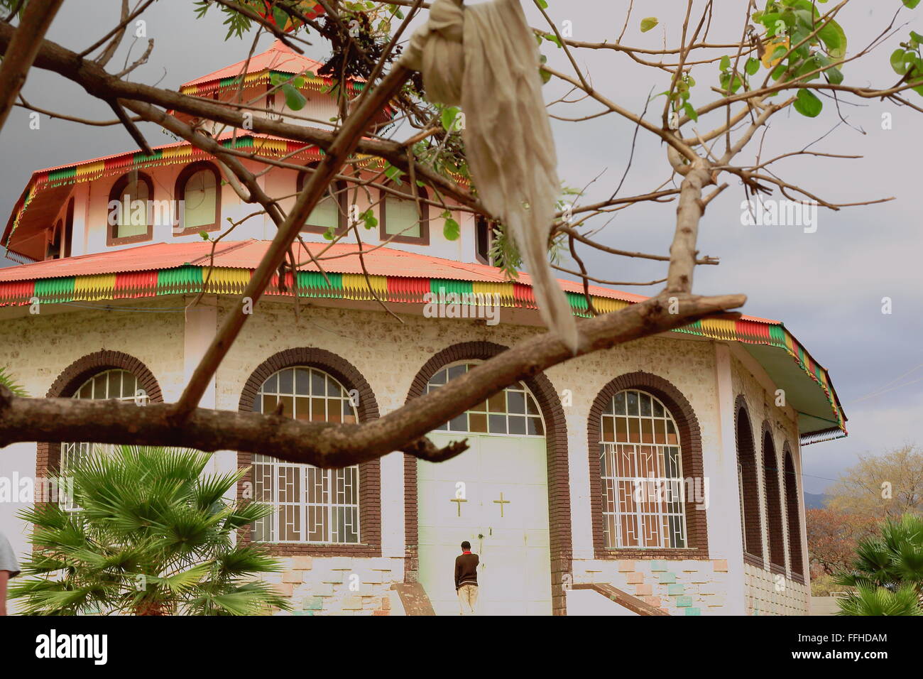 Local man prays at the closed gate of Bete Gebriel-Saint Gabriel ...